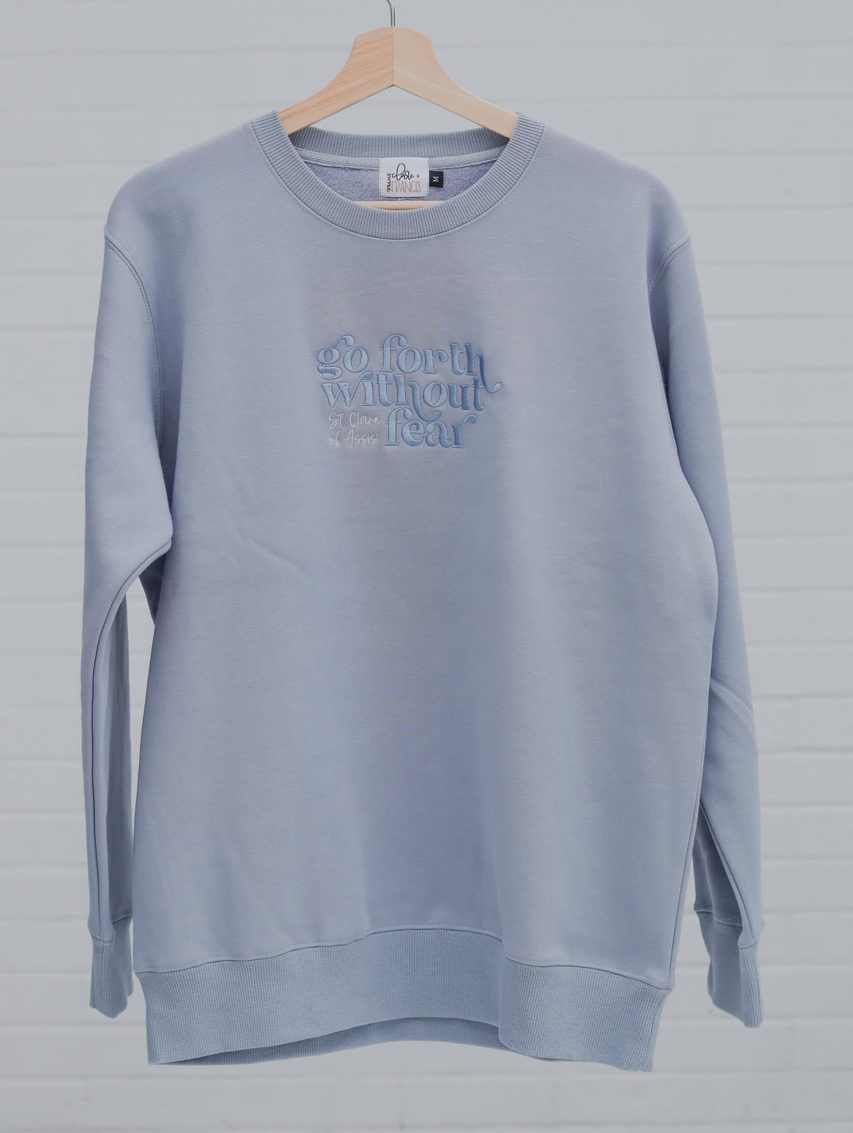 Go Forth Without Fear Catholic crewneck – Saint Clare and Francis
